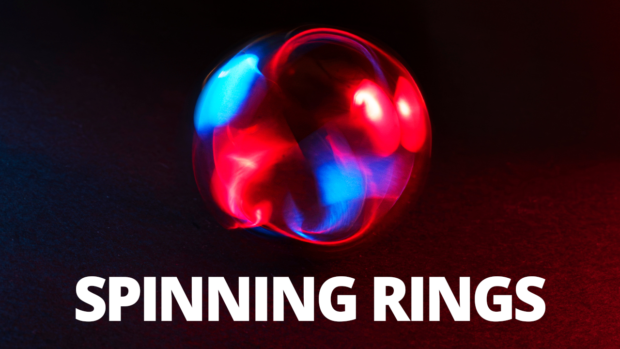 Abstract wedding ring photography idea - Spinning orbs of light!