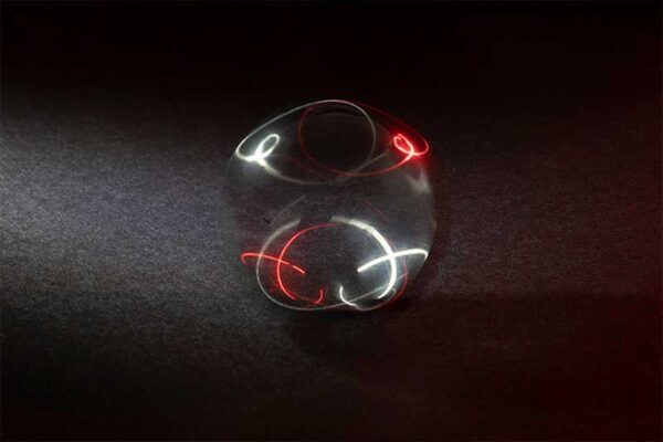 Abstract wedding ring photography idea - Spinning orbs of light!